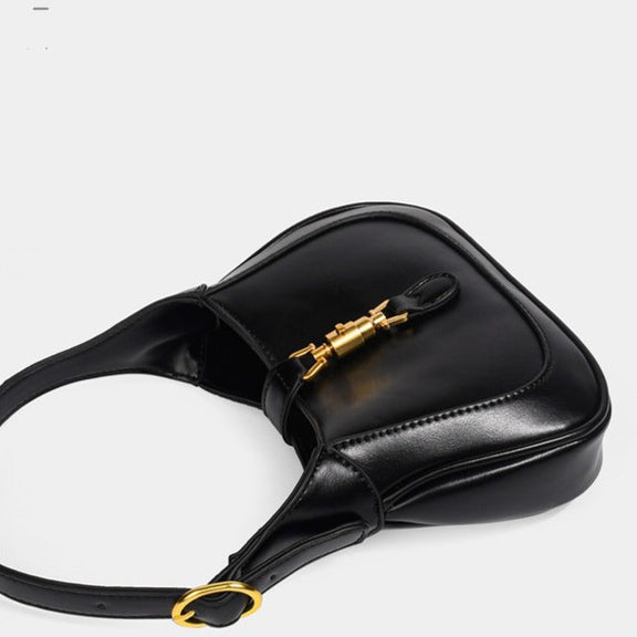 Black Classic Curved Leather Handbag with Signature Buckle Closure ...